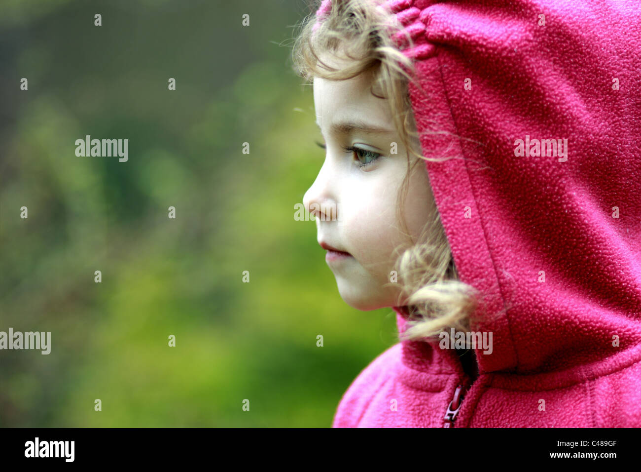 portrait of a charming girl in the hood Stock Photo - Alamy