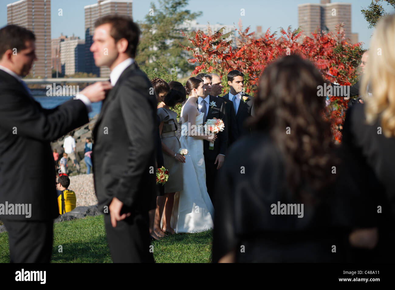 Best men and bride and groom at a wedding party, New York City, USA ...