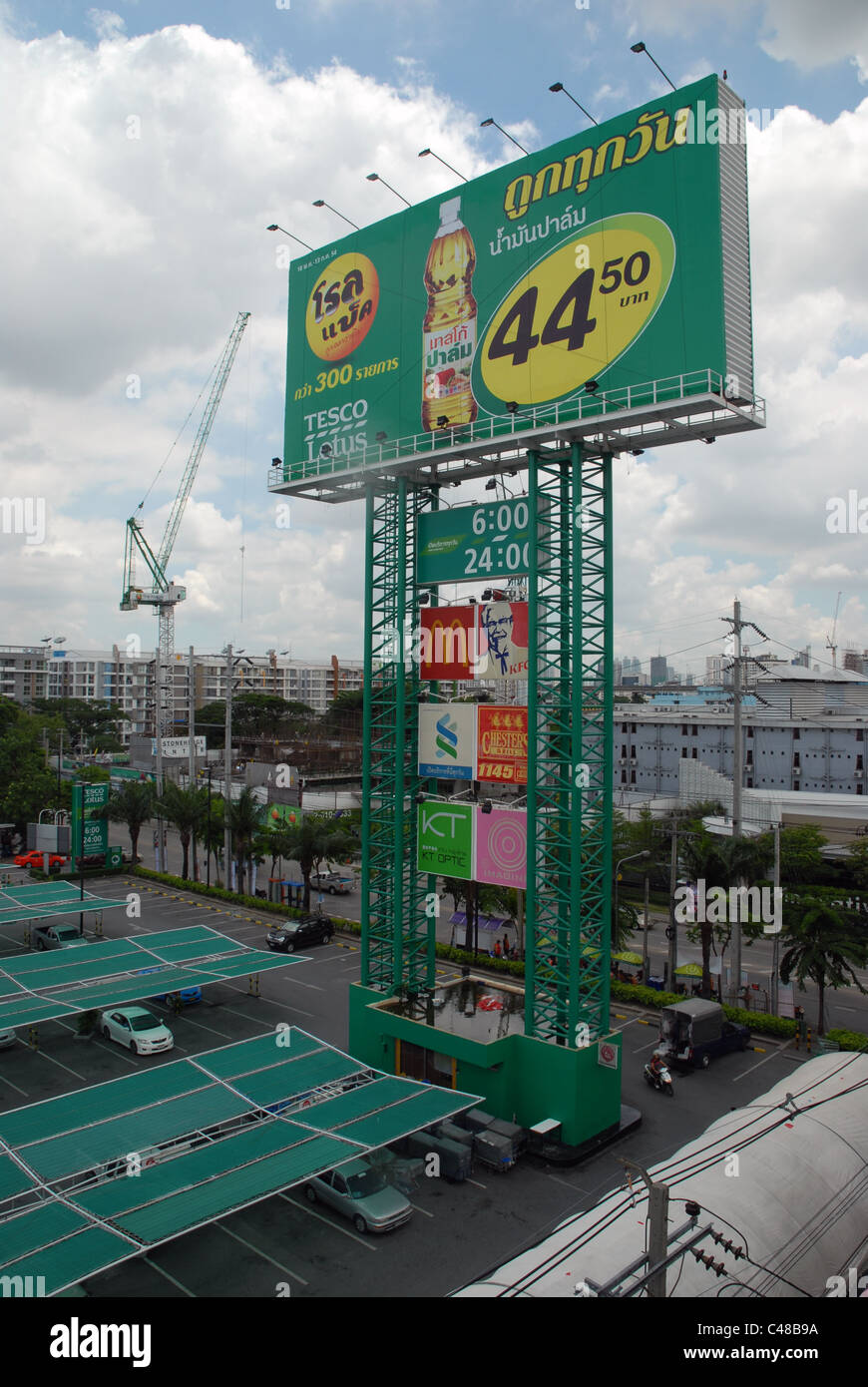 Tesco advertising sign seen from Ekumai train station, Bangkok ...