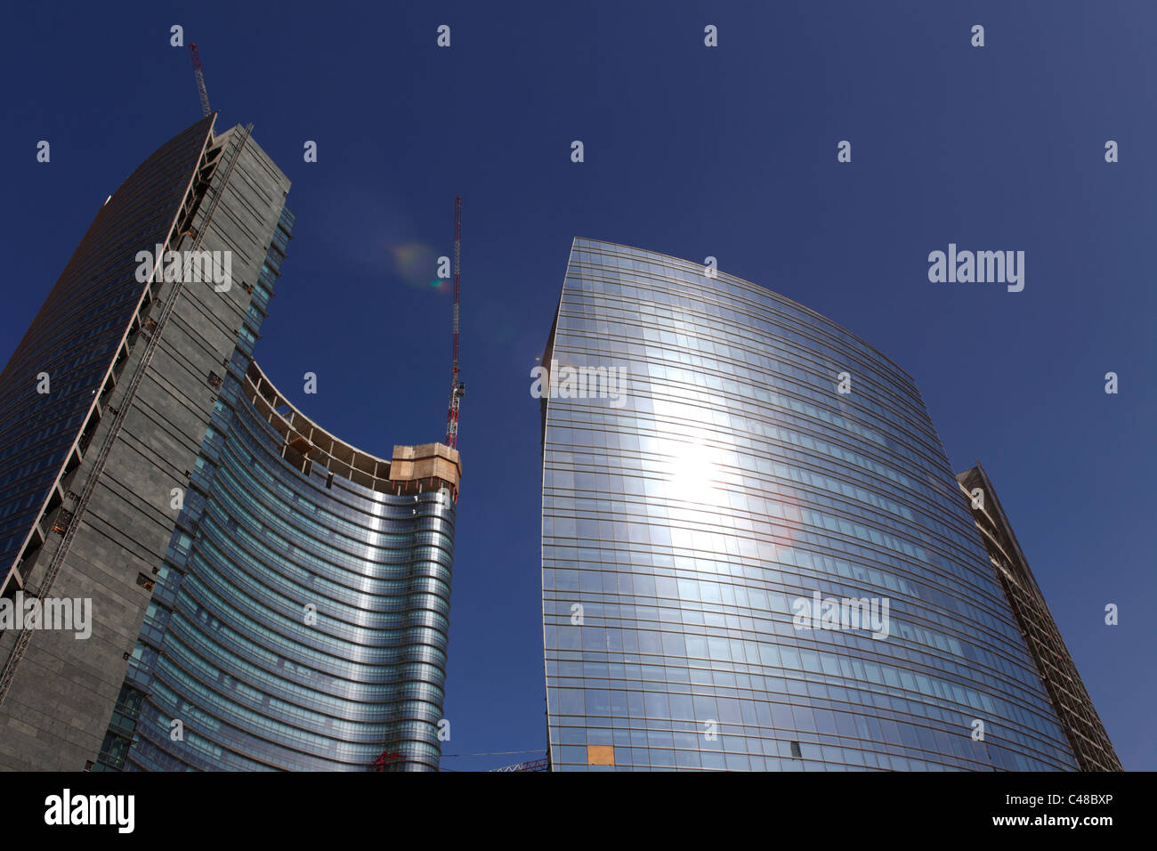 The modern skyscrapers under construction in Porta Nuova, Milan, Italy ...