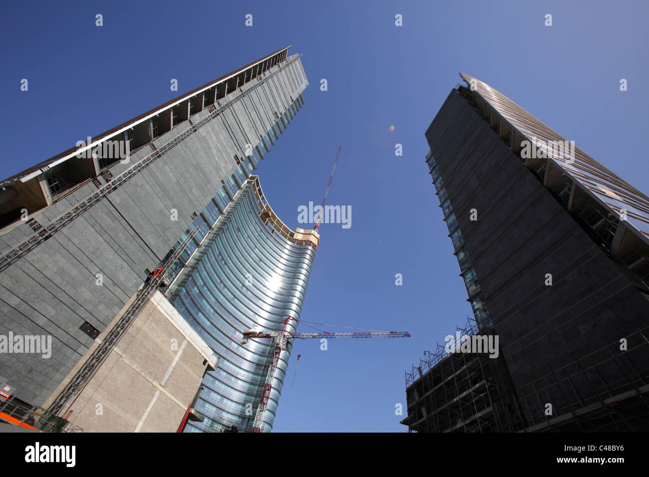 The modern skyscrapers under construction in Porta Nuova, Milan, Italy ...