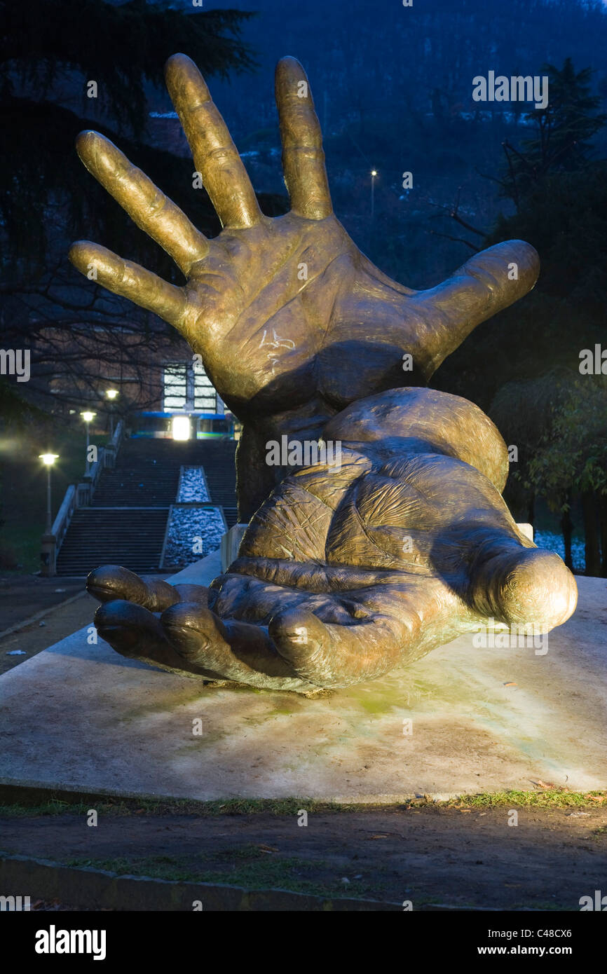 Two hands sculpture at night. Viale Tokamachi. Como on Lake Como. Lombardy. Italy Stock Photo ...