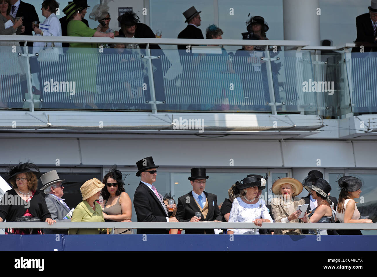 Spectators at The Derby at Epsom Downs Racecourse Stock Photo - Alamy