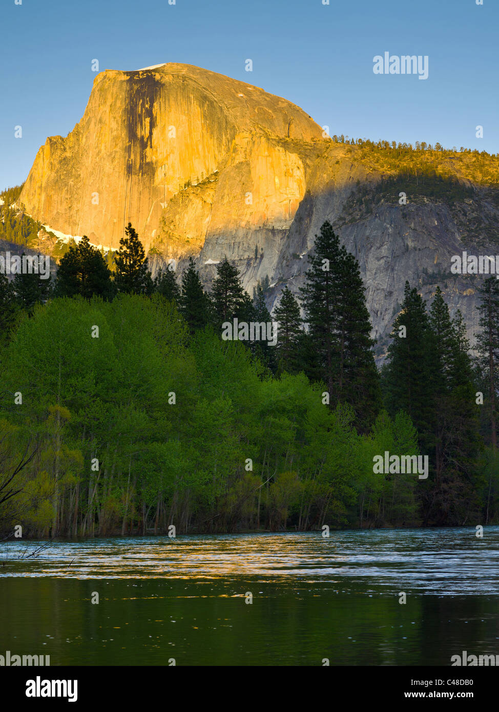 Half Dome at sunset along the Merced River, Yosemite Valley, spring ...