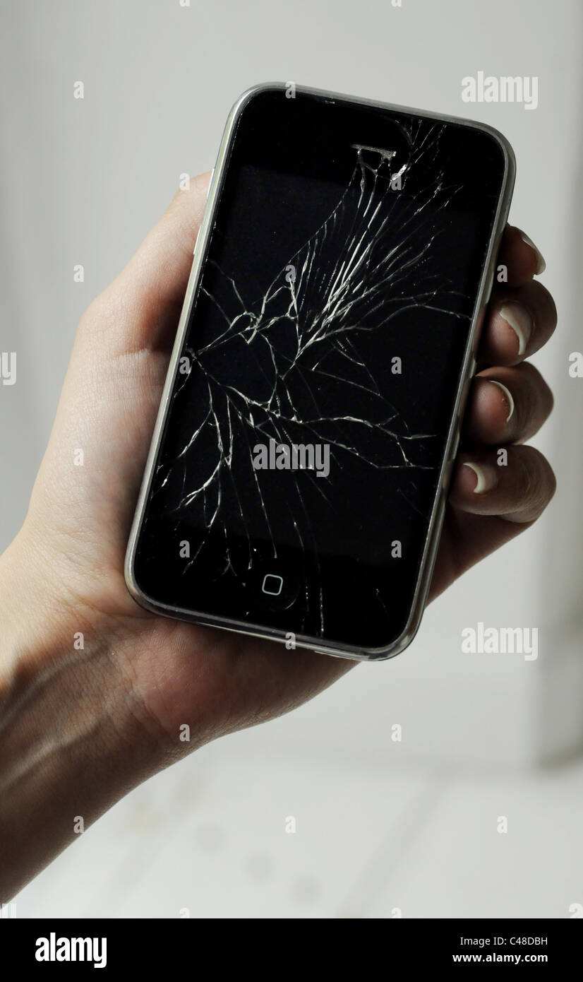 A broken iPhone with a cracked screen Stock Photo - Alamy