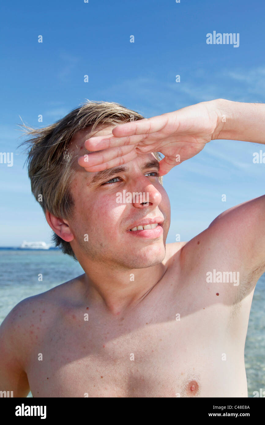 Shading her eyes with hand hi-res stock photography and images - Alamy