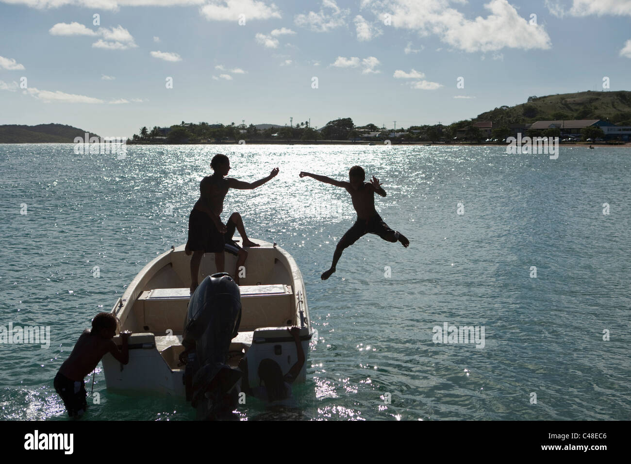 Group Jumping Off Boat High Resolution Stock Photography and Images - Alamy