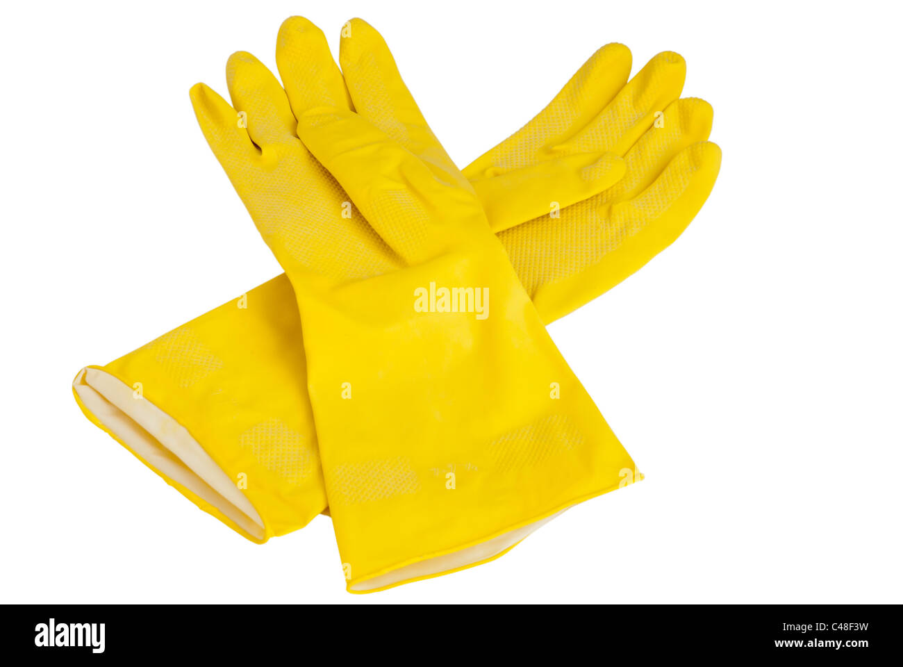 Pair of yellow rubber gloves Stock Photo - Alamy