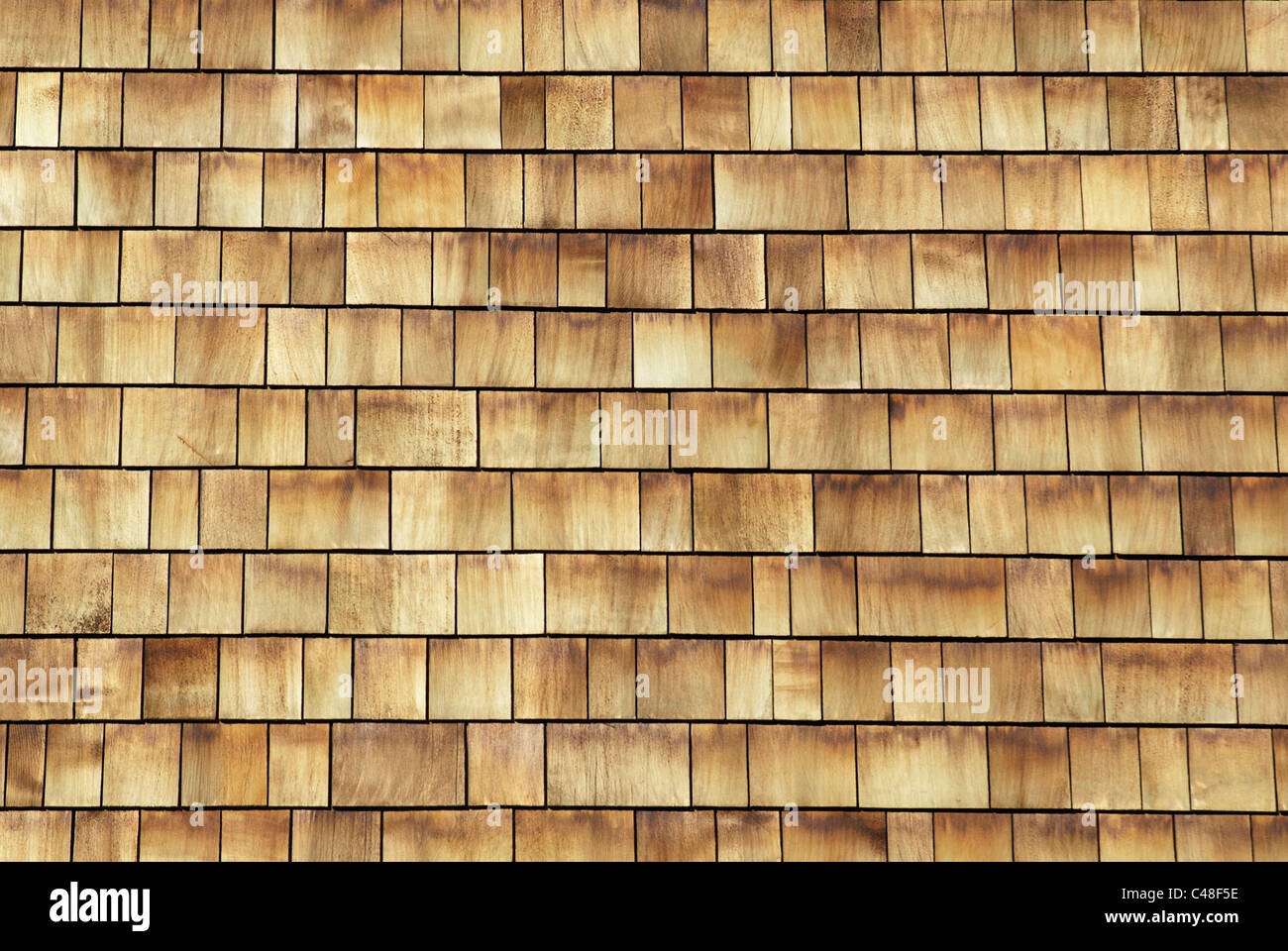 Cedar shingle cladding on a modern mixed-use development London UK ...