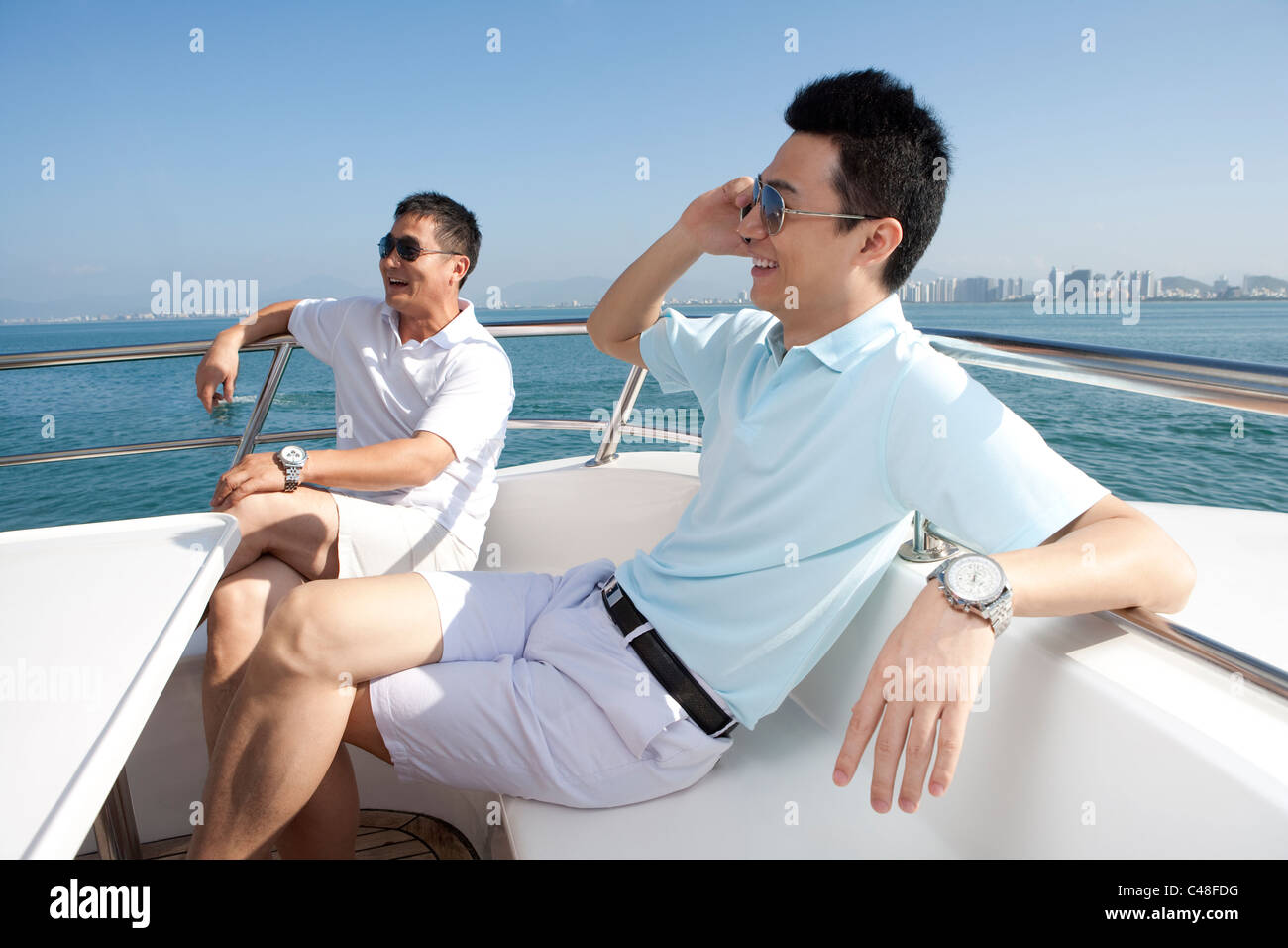 Relaxing on a Yacht Stock Photo - Alamy