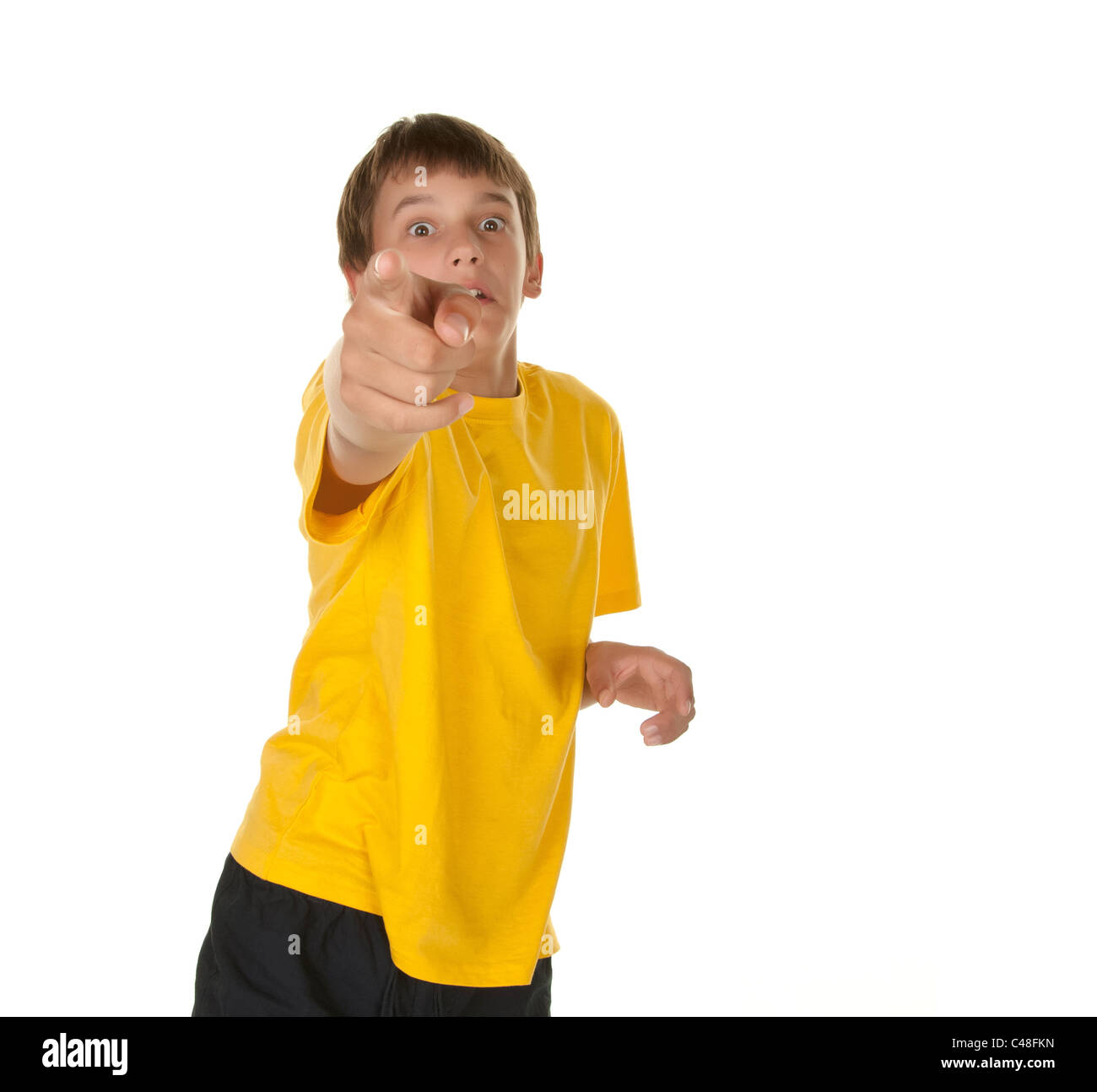 boy pointing towards the camera isolated white Stock Photo - Alamy