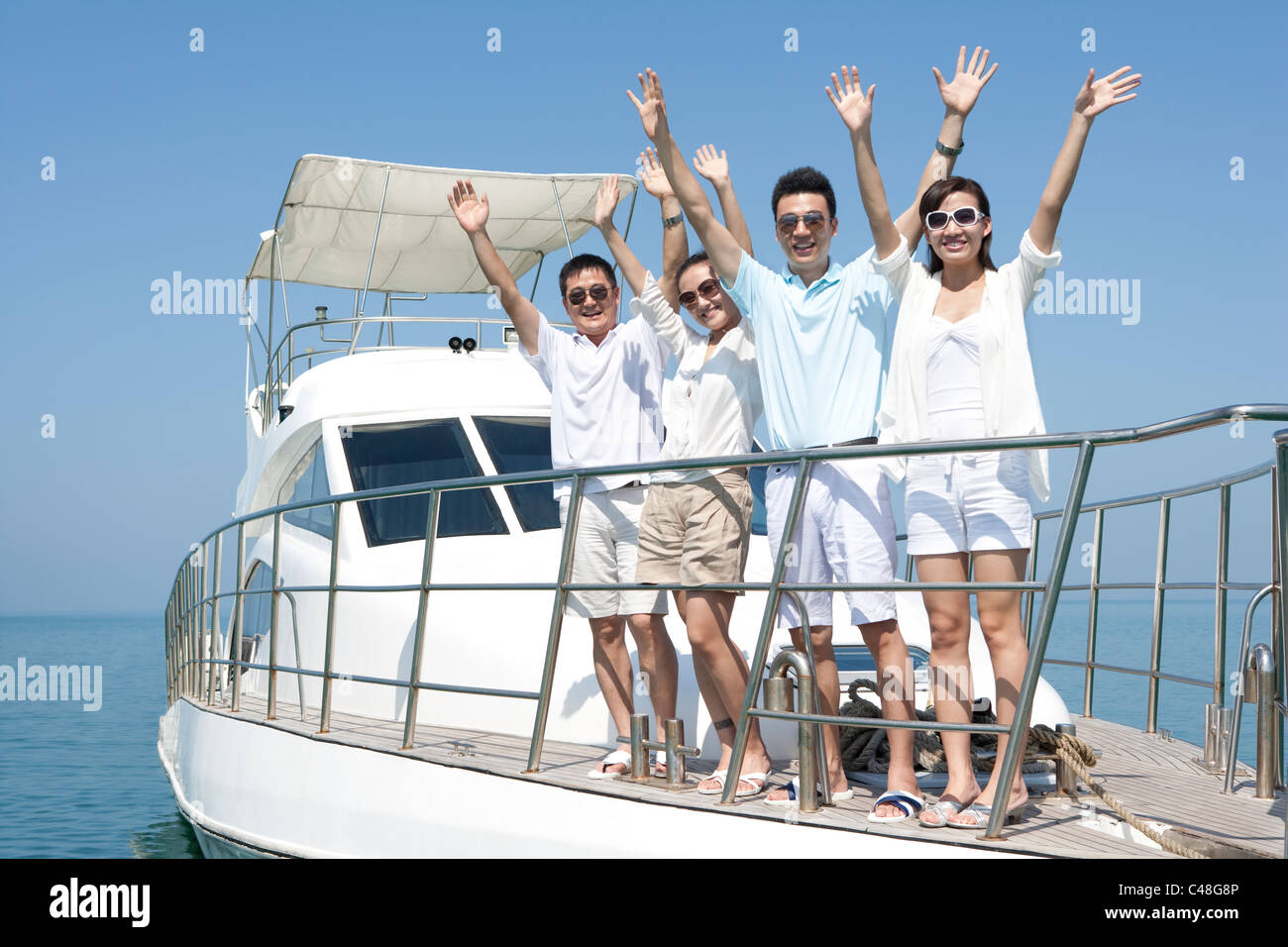 Friends Having Fun on a Yacht Stock Photo - Alamy