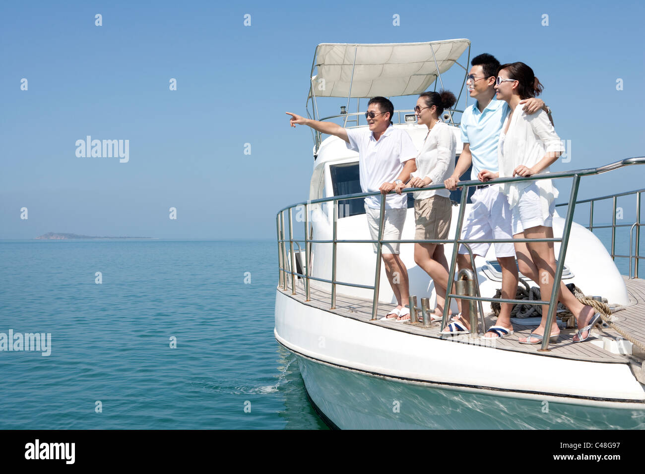 Friends Having Fun on a Yacht Stock Photo - Alamy