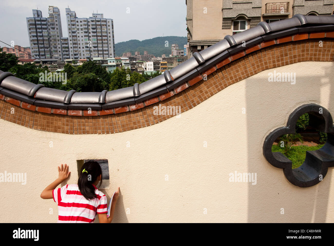 Looking through a wall in Yingge, Taiwan, October 24, 2010 Stock Photo ...
