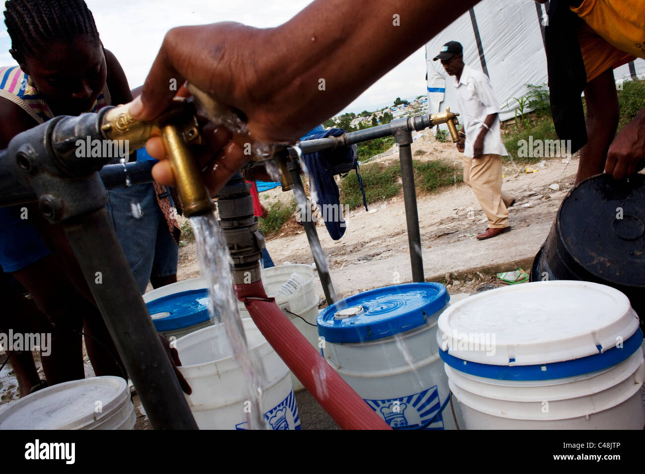 Bucket of water hand hi-res stock photography and images - Alamy