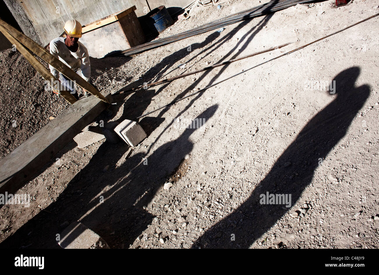 Shadow of worker hi-res stock photography and images - Alamy