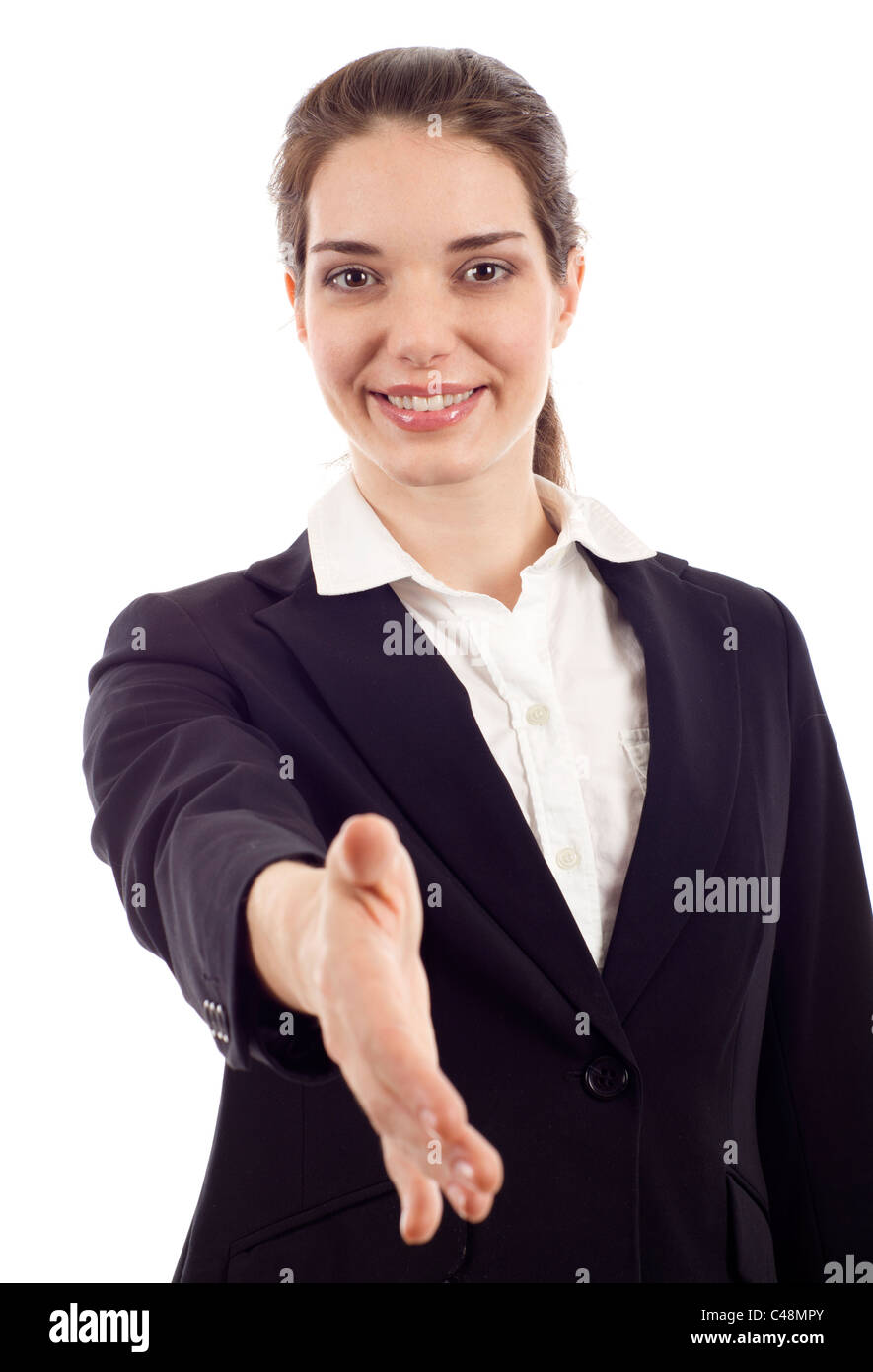 Portrait of positive business woman stretching her hand for a handshake ...