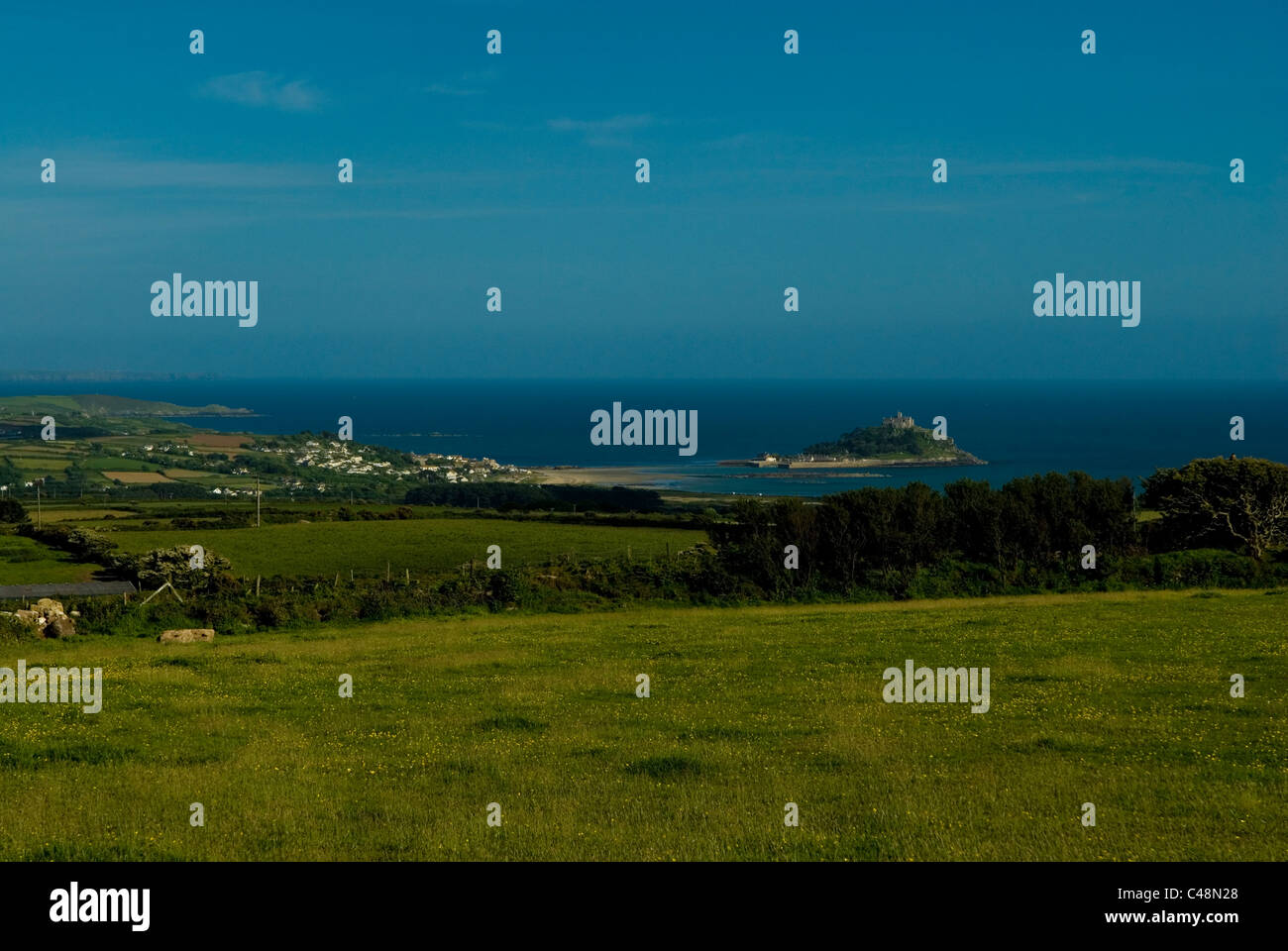 Looking down over green fields towards St Michaels Mount, Cornwall ...