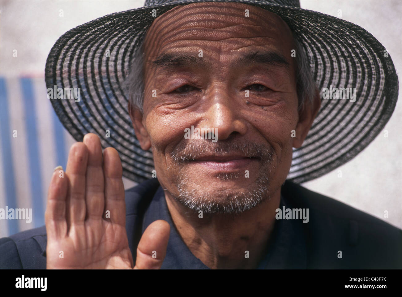 Closeup of an old Chinese man in Beijing Stock Photo - Alamy