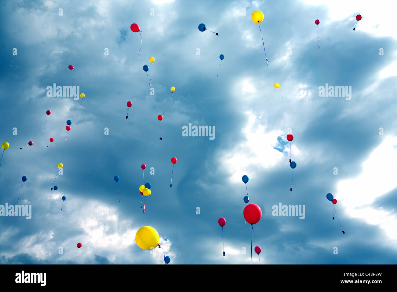 balloons flying into the sky Stock Photo - Alamy