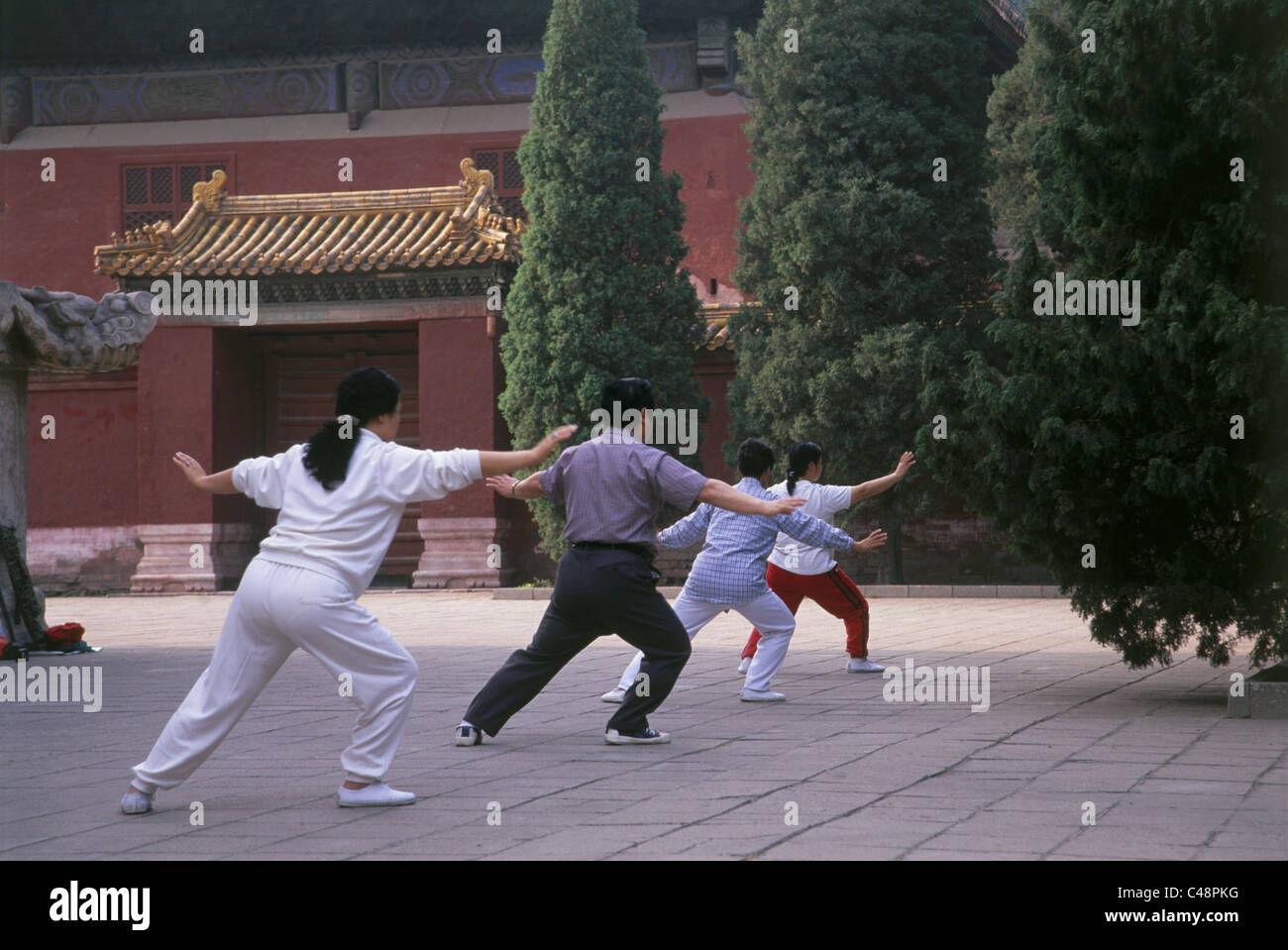 Photograph of a group of Chinese people doing the morning exercise in ...