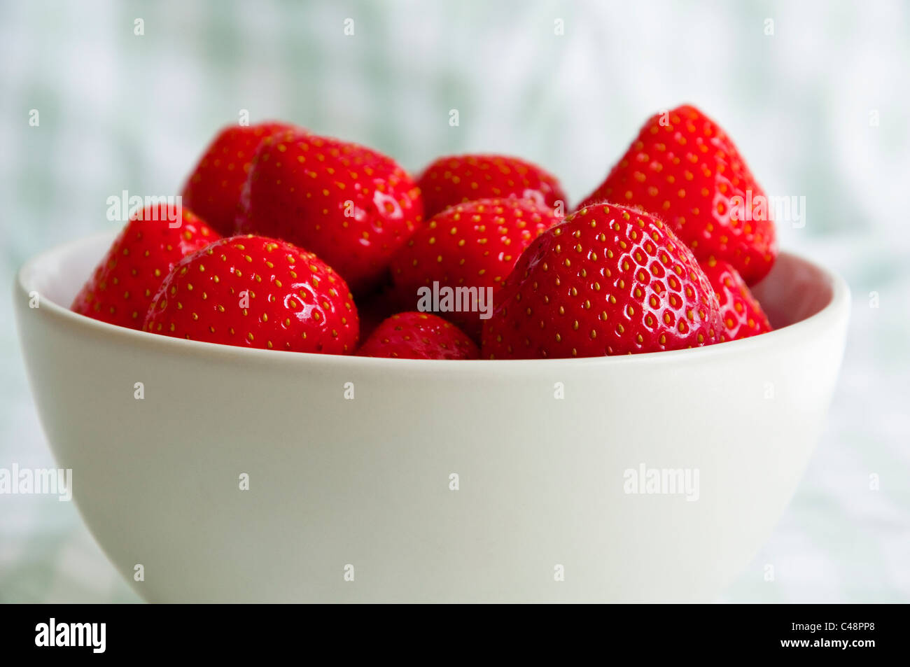 Strawberry white bowl strawberries hi-res stock photography and images ...