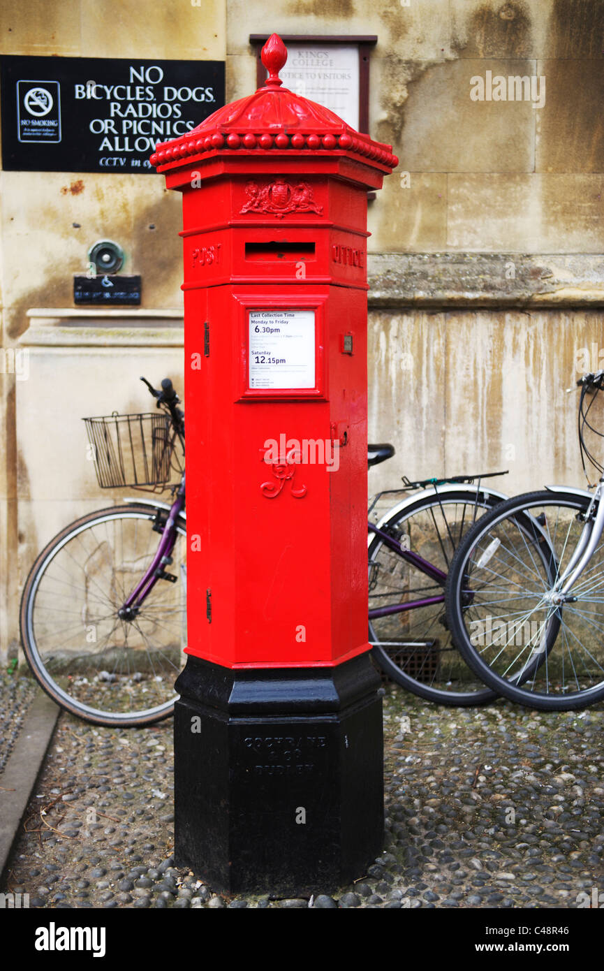 Traditional British red pillar post box in the university town of ...