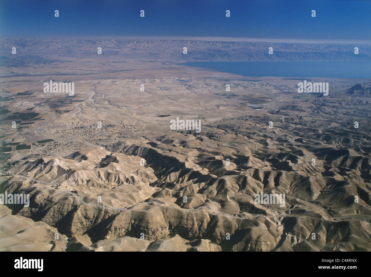 Aerial view of the Judea desesrt and the northern basin of the Dead sea ...