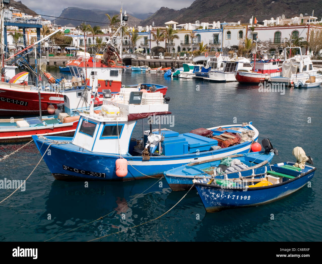 Fishing boats in the harbour at Puerto de Mogan Stock Photo - Alamy