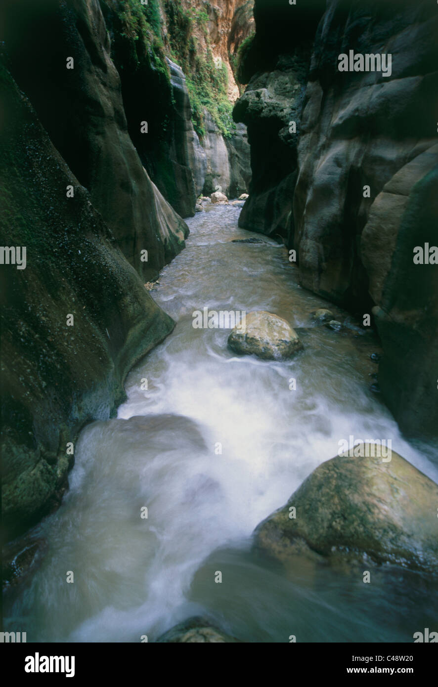 Rain falling on Wadi Iben Hamed Stock Photo - Alamy