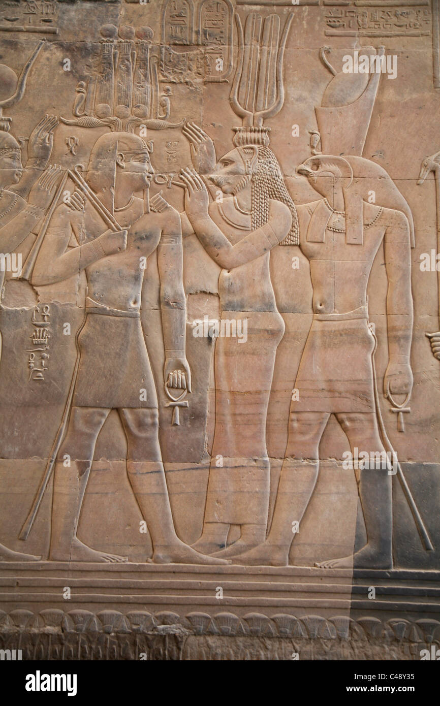 egyptian gods in a temple's wall Stock Photo - Alamy