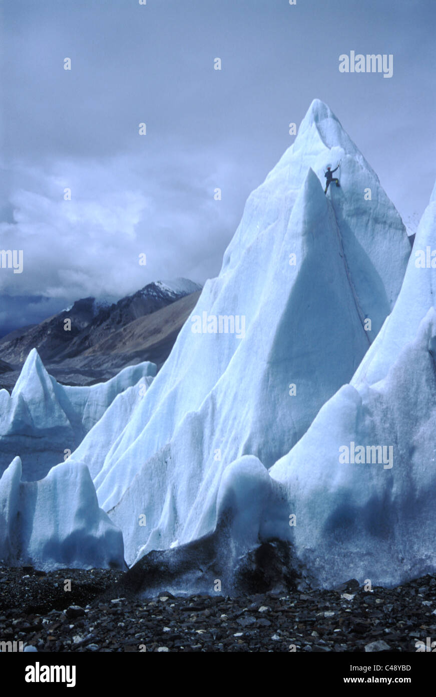 Man climbing vertical glacier ice hi-res stock photography and images ...