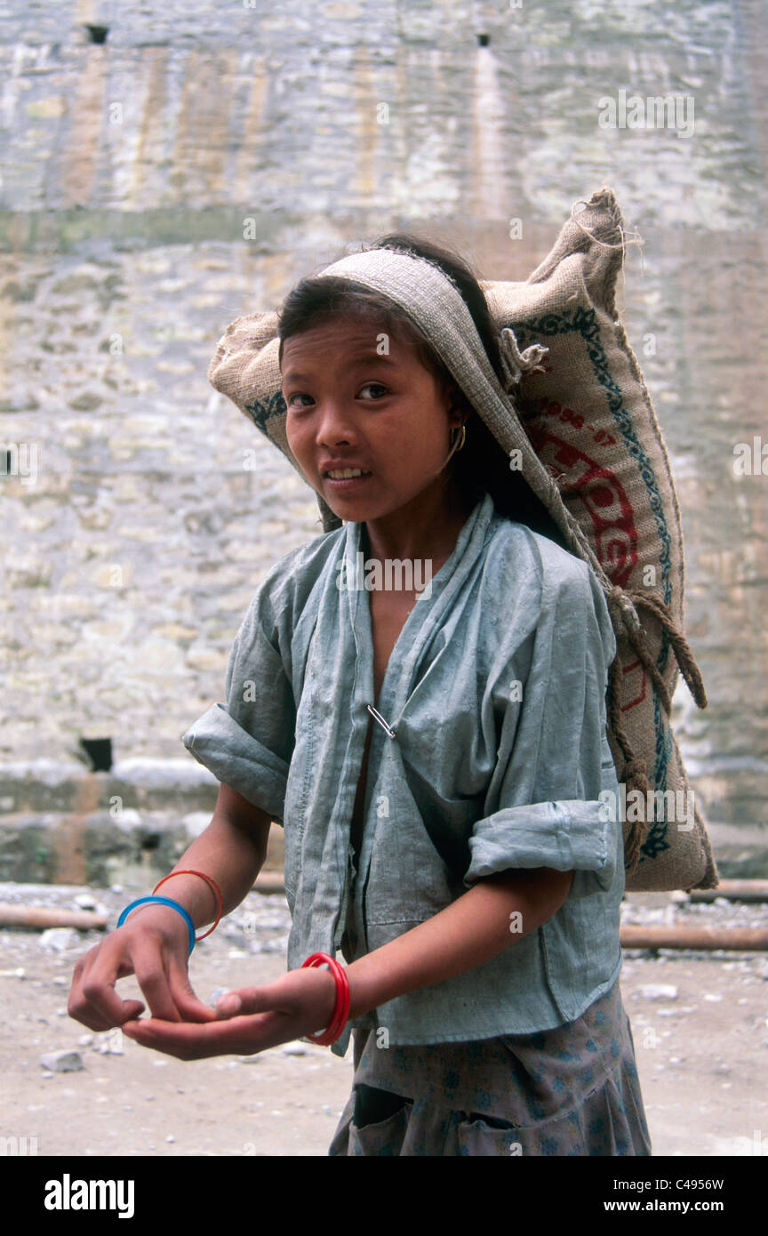 Child carrying sack hi-res stock photography and images - Alamy