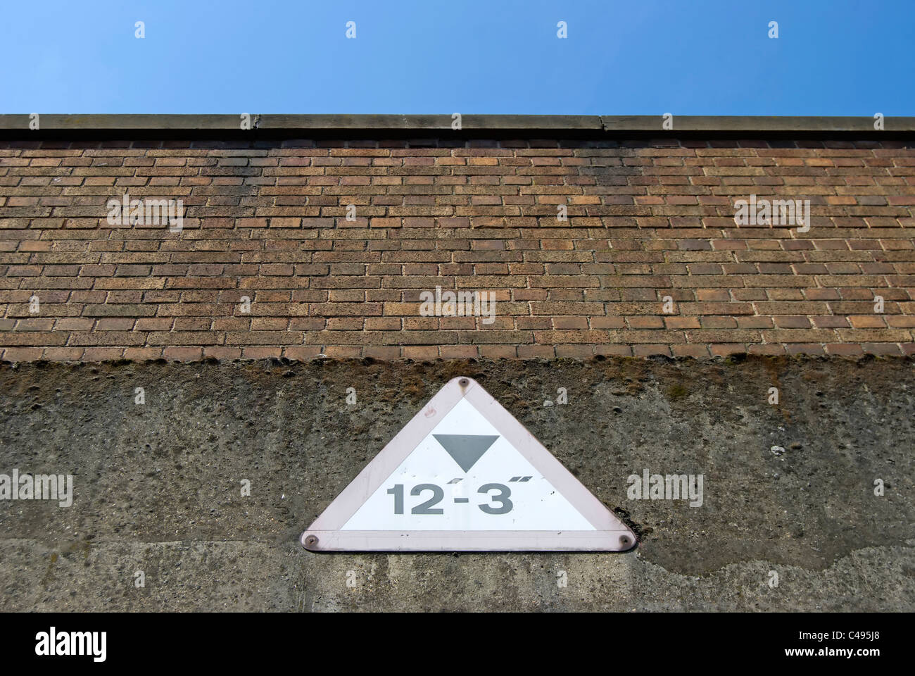 british road sign indicating the available width of headroom beneath a ...