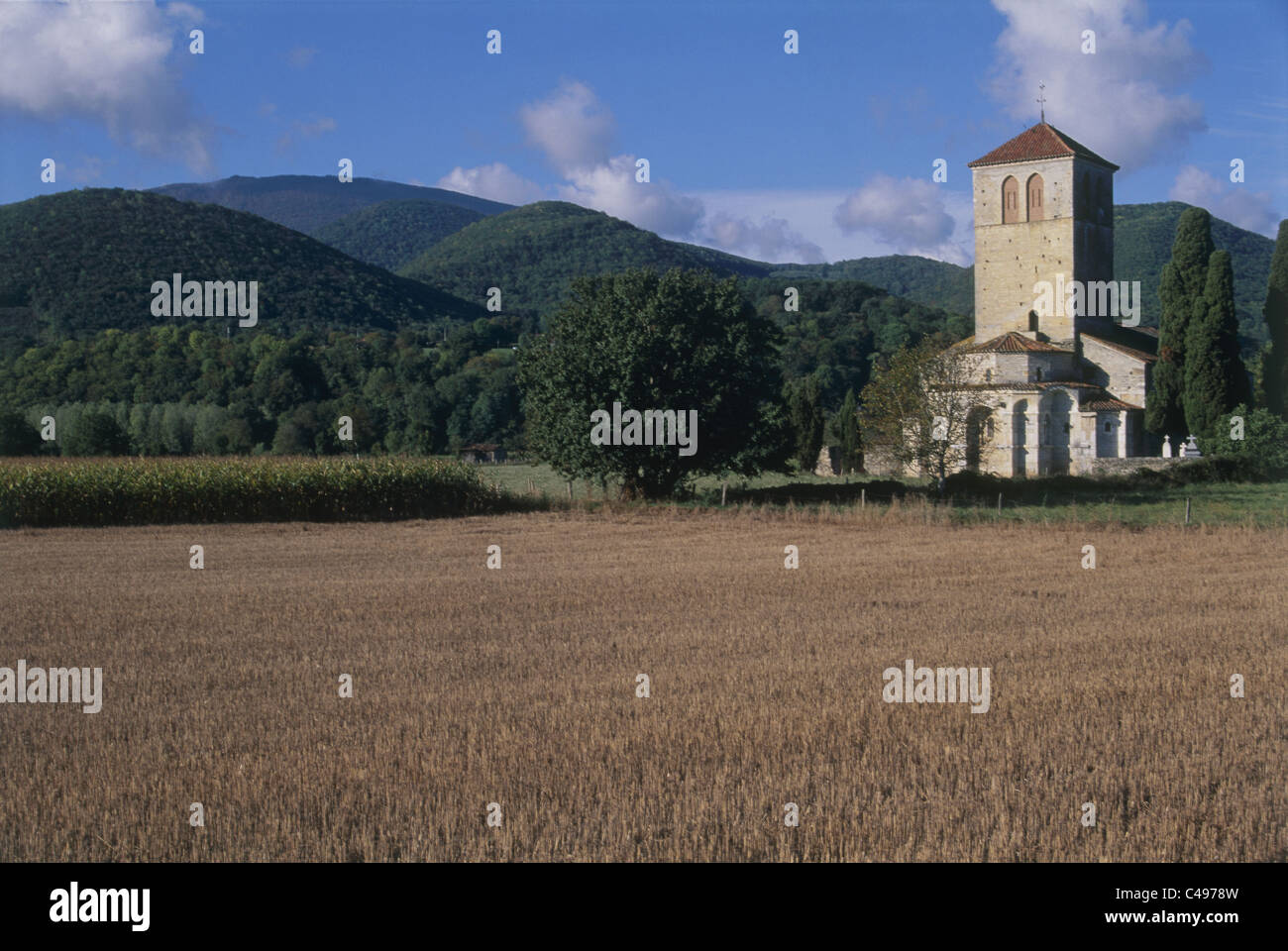 Photograph of a church in a field in France Stock Photo - Alamy
