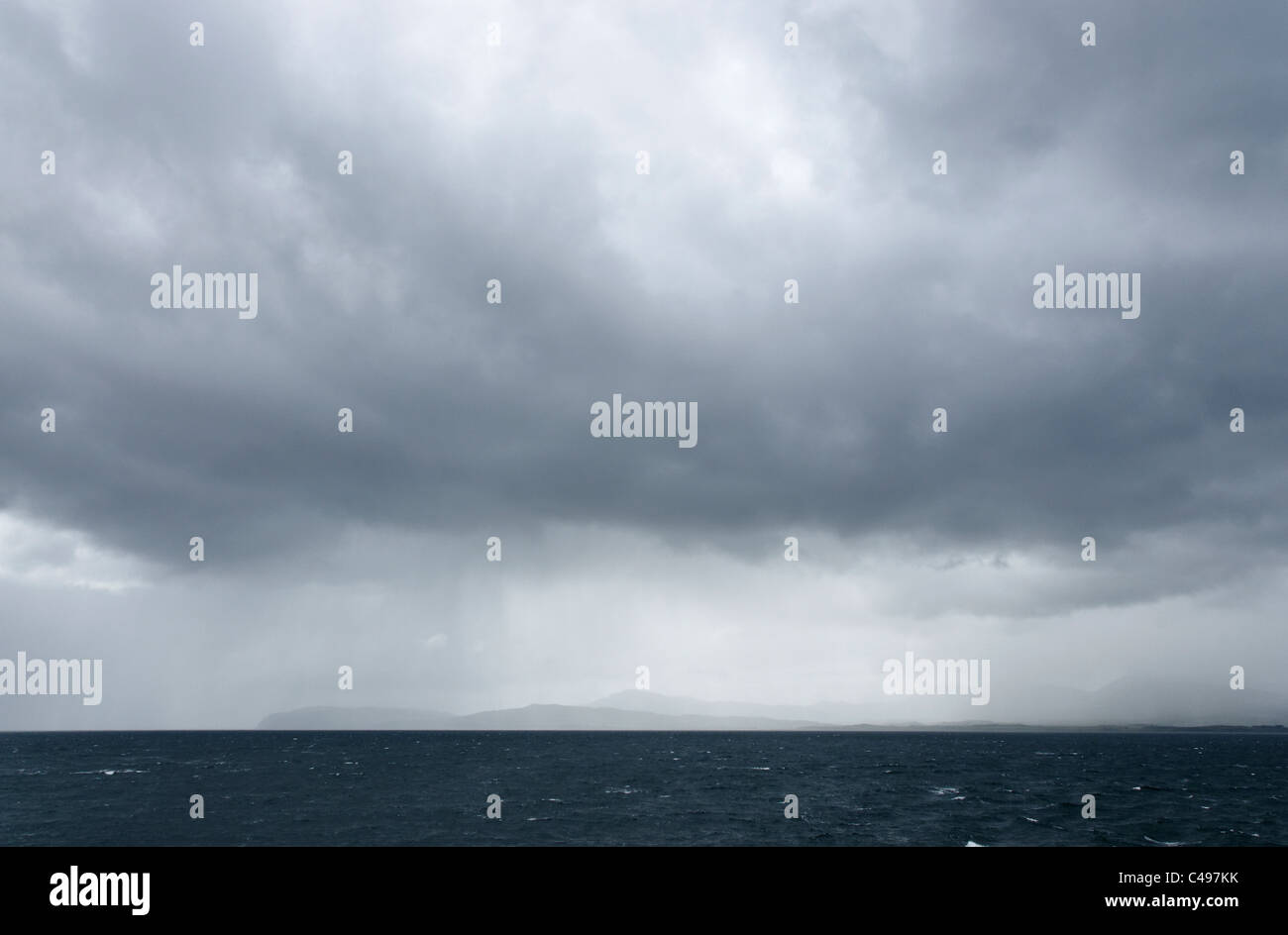 A cloudy and showery afternoon on the Sound of Mull Stock Photo - Alamy