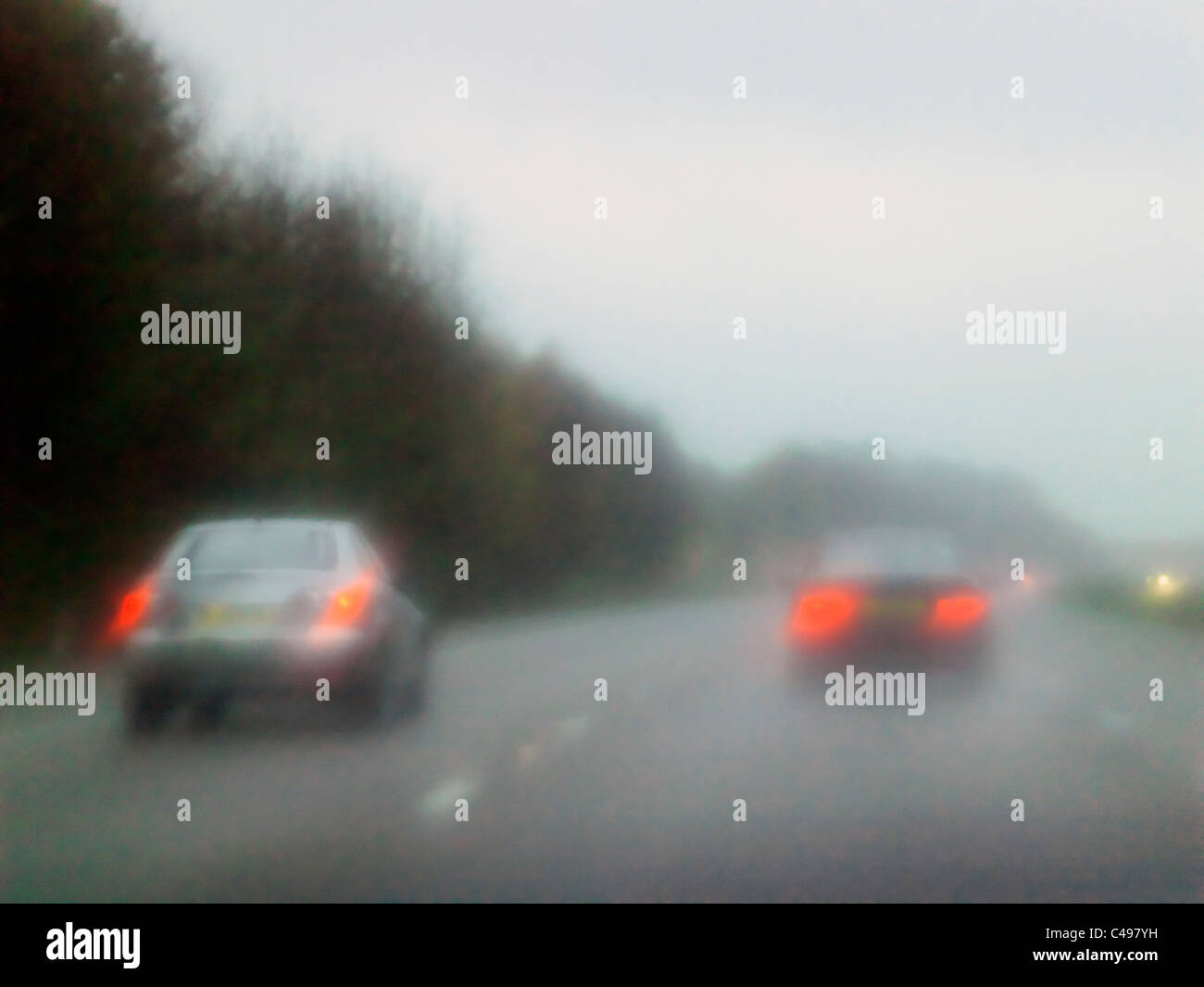 Cars Driving In Bad Weather on The M20 Motorway England Stock Photo - Alamy