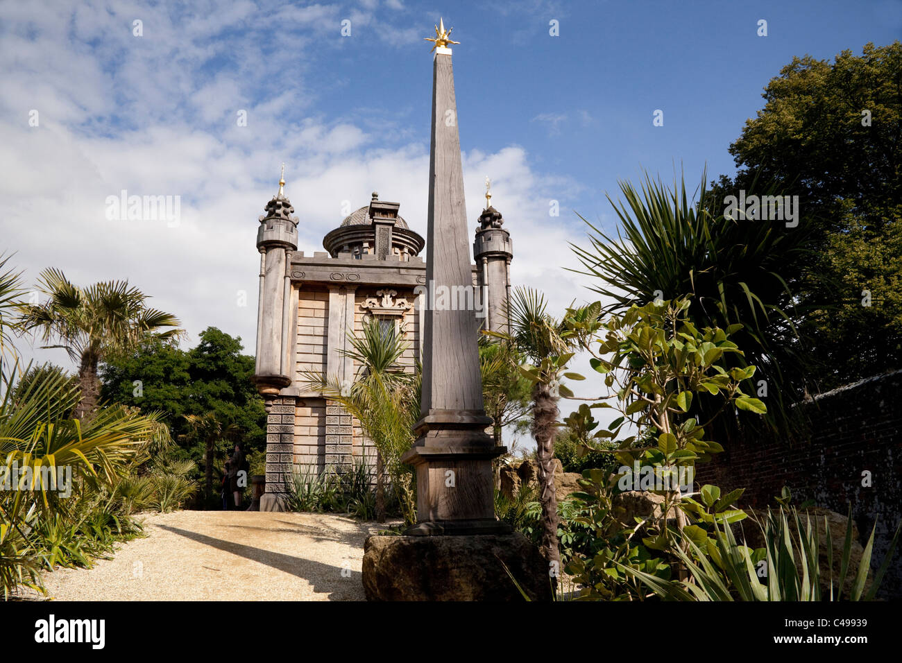 Gardens of Arundel Castle with wooden obelisk West Sussex near ...