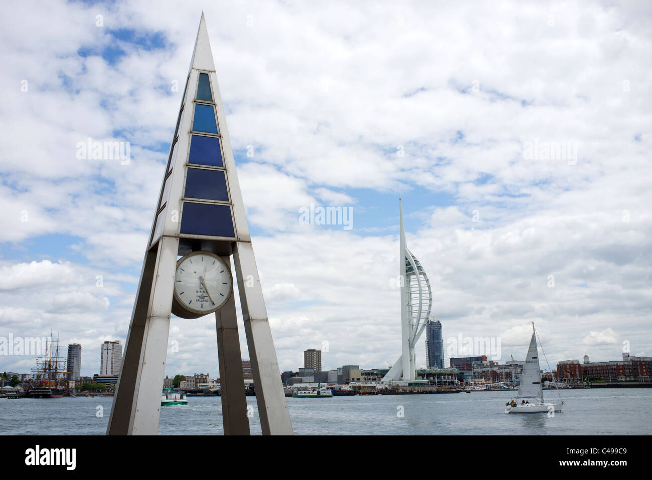 Gosport millennium clock with the spinnaker tower in Portsmouth harbour ...