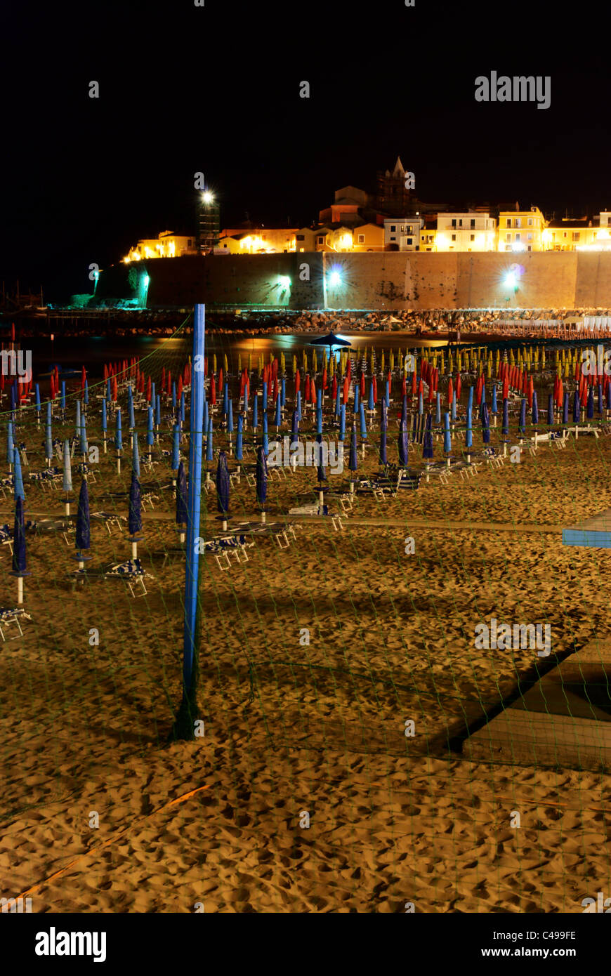 Night view of Termoli beach with old town and lighthouse in the ...