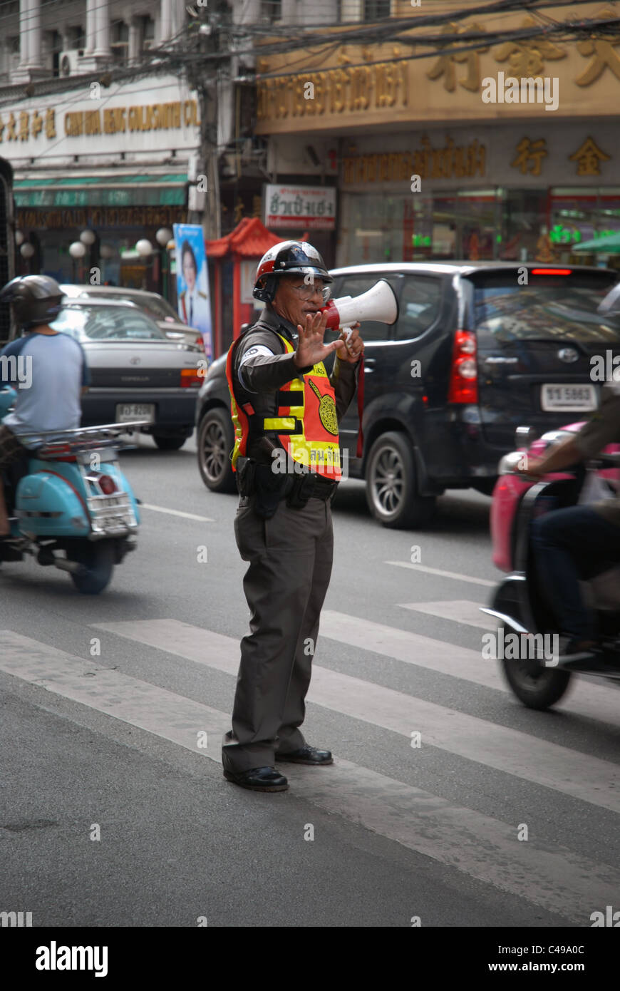 Traffic cop, Chinatown Bangkok Thailand Stock Photo - Alamy
