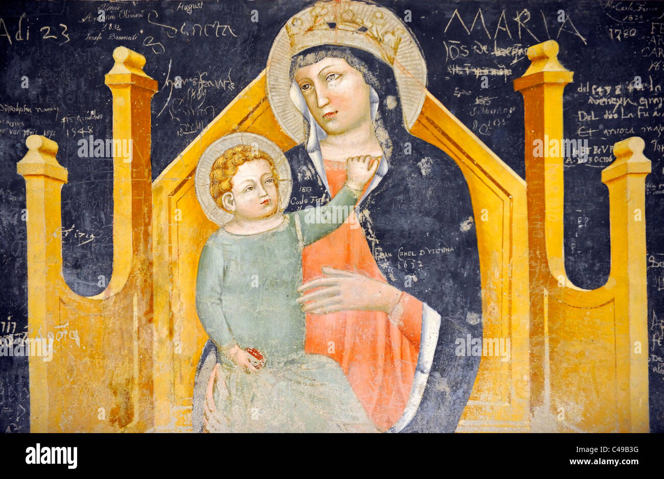 A votive fresco panel depicting the Virgin Mary enthroned with child in ...