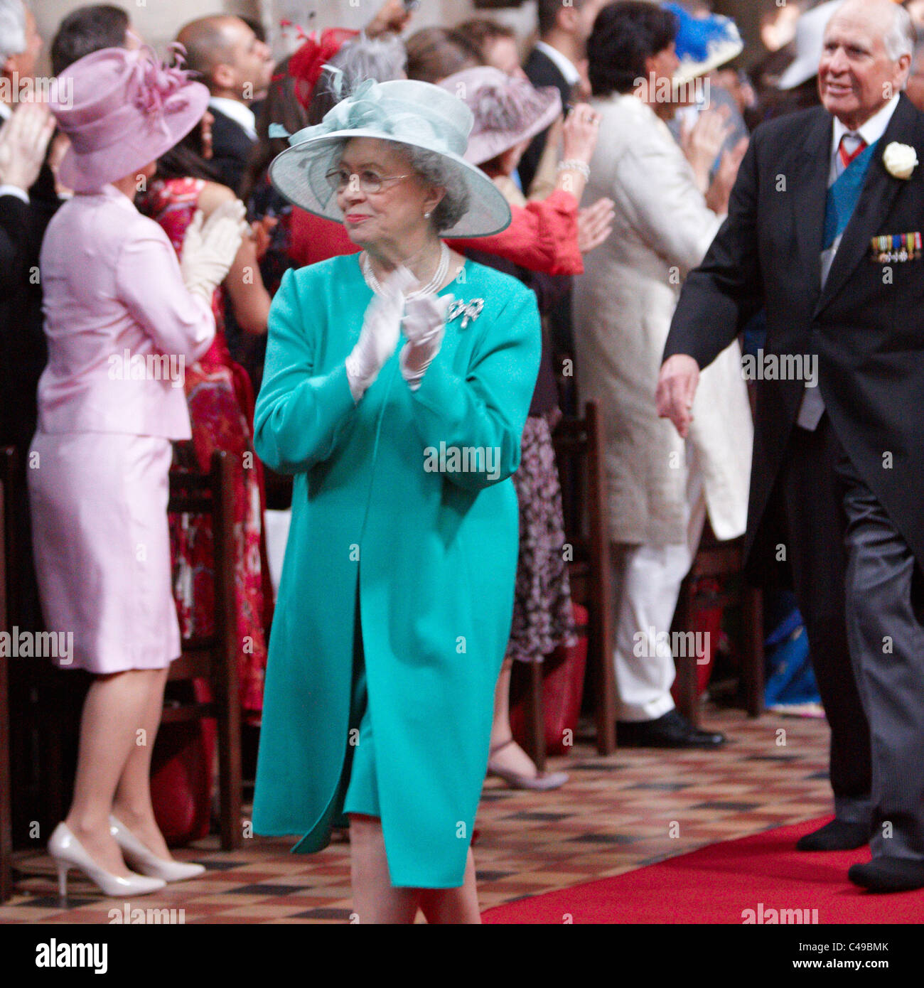 Lookalikes pretend to get married at a mock royal wedding ceremony ...