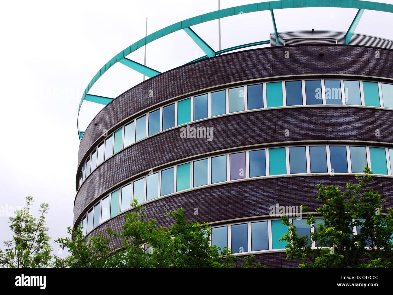 modern building with colored windows over sky Stock Photo - Alamy