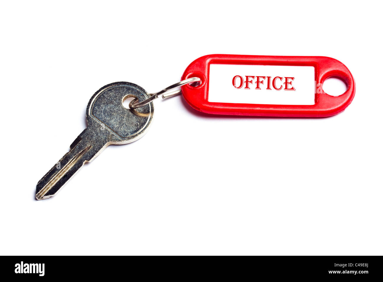 Office key and tag isolated on white background Stock Photo - Alamy