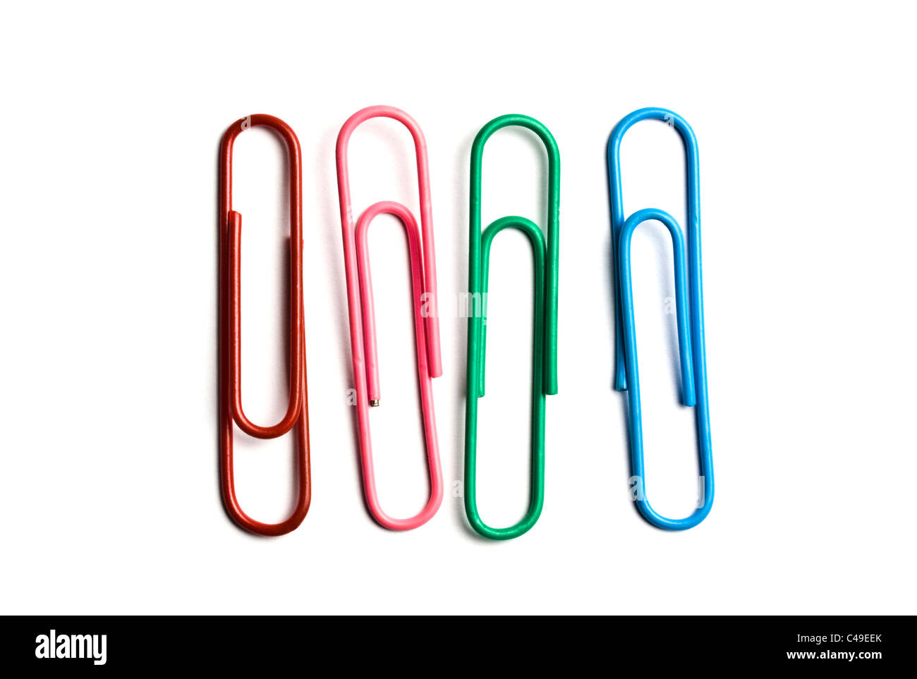 Four multicolored paper-clips isolated on white background Stock Photo ...