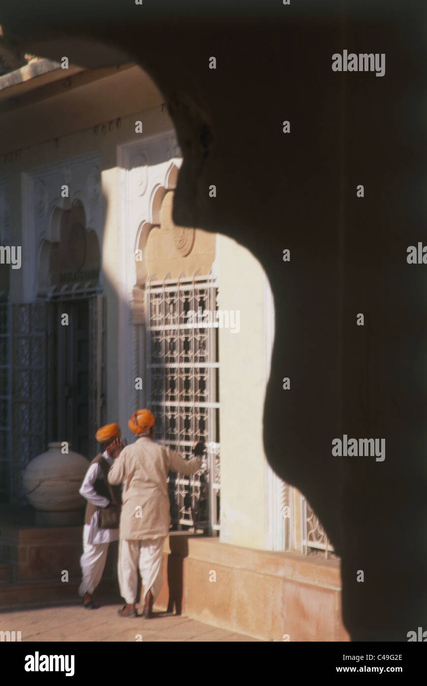 Photograph of two Indian men standing and talking in Jodhpur India ...