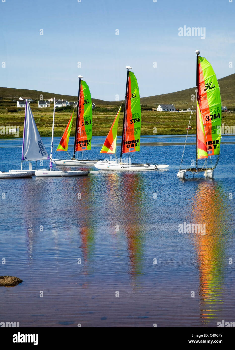 Photograph of Catamarans in a small bay in Ireland Stock Photo - Alamy