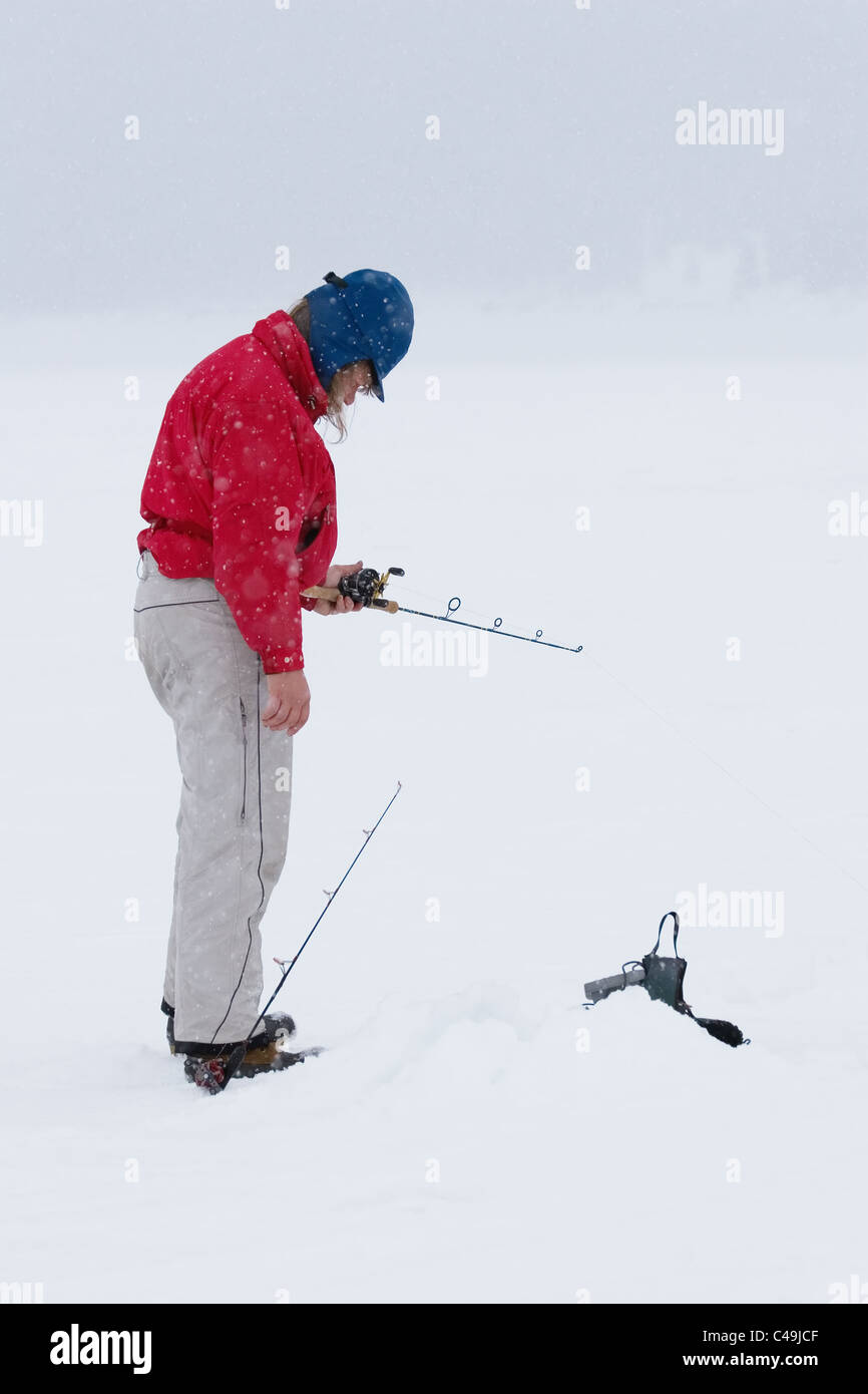 Woman ice fishing hi-res stock photography and images - Alamy