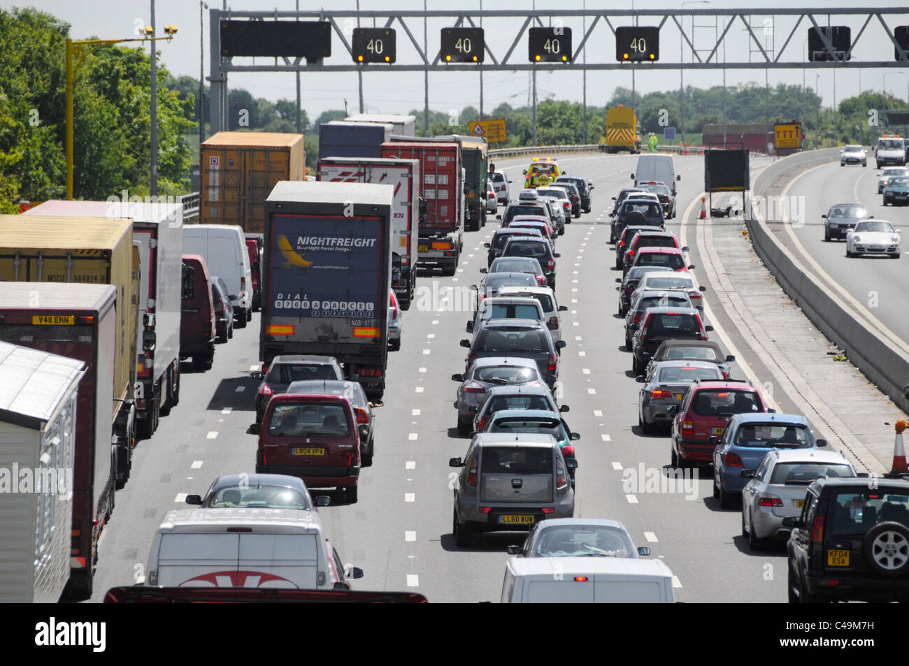 M25 motorway gantry signs set at 40mph with traffic in fact stationary ...